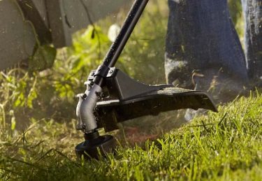 How to Mow Lawn Using Weed Wacker - BackyardWorkshop.com